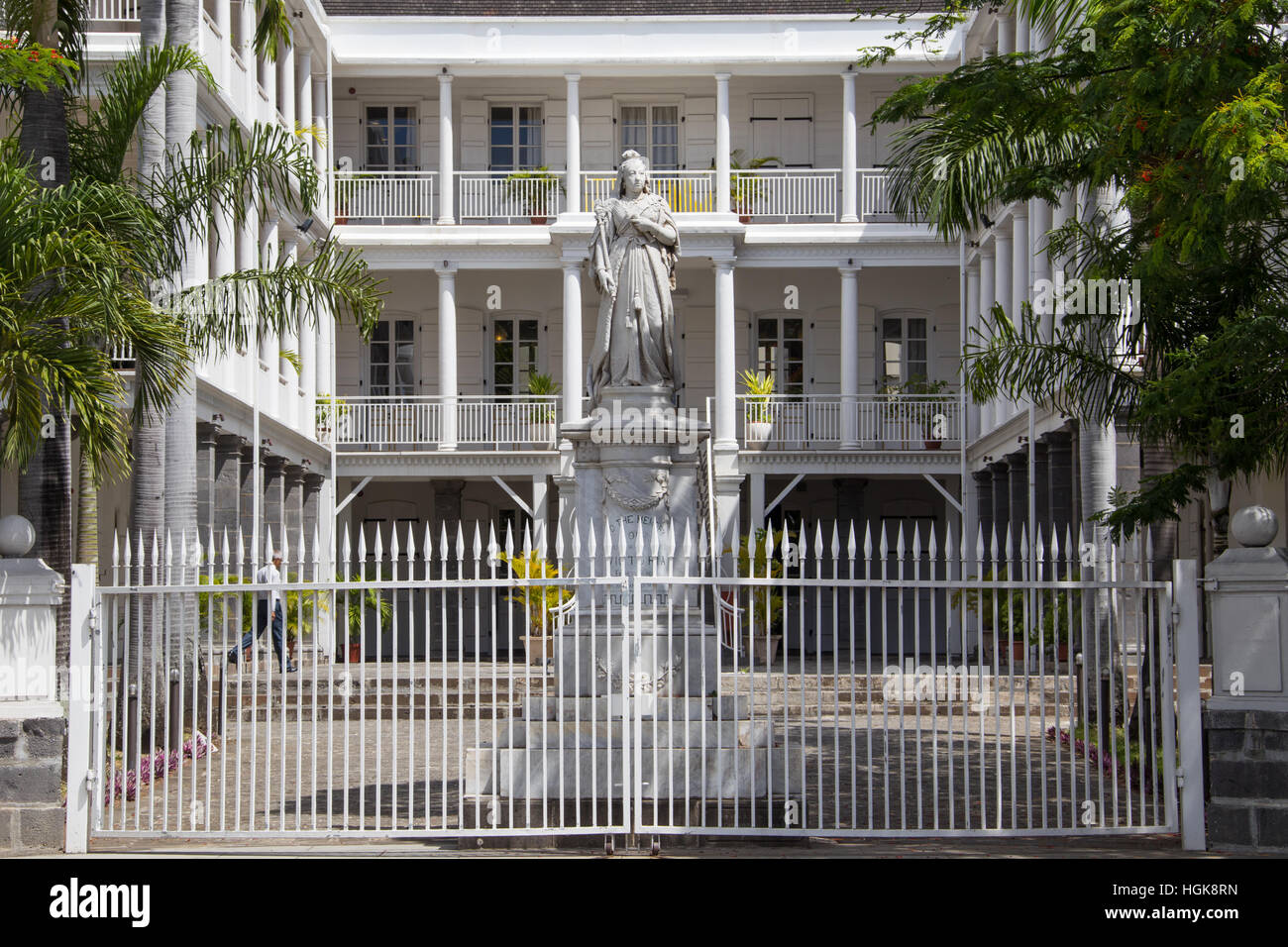 Statue of Queen Victoria, Government House, French Colonial building ...