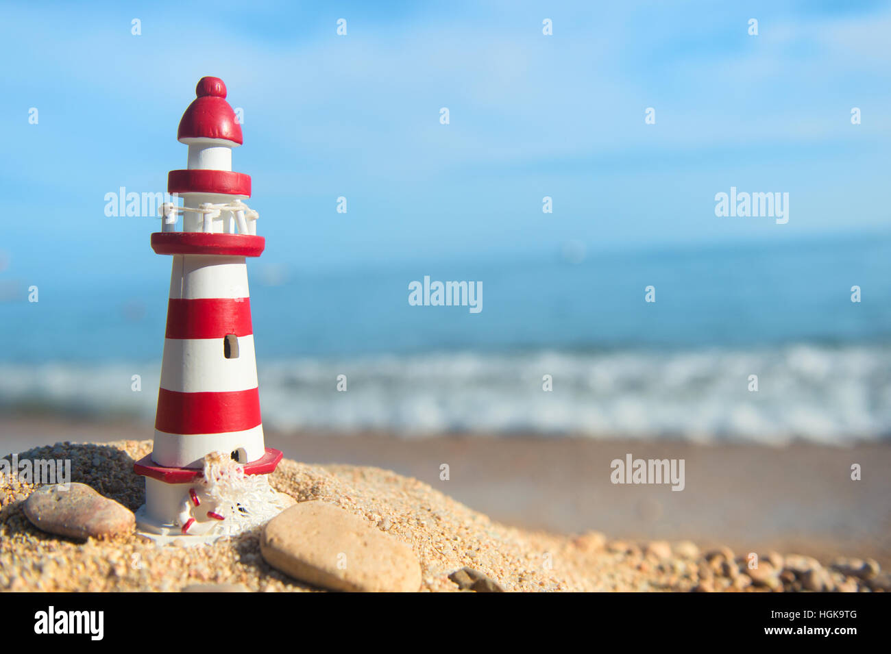 Miniature lighthouse at the beach Stock Photo - Alamy