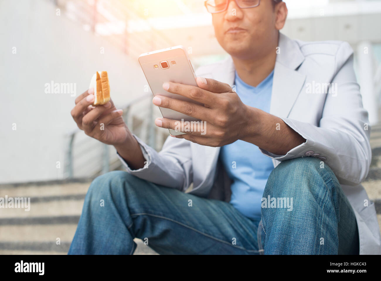 Fat office worker eating hi-res stock photography and images - Alamy