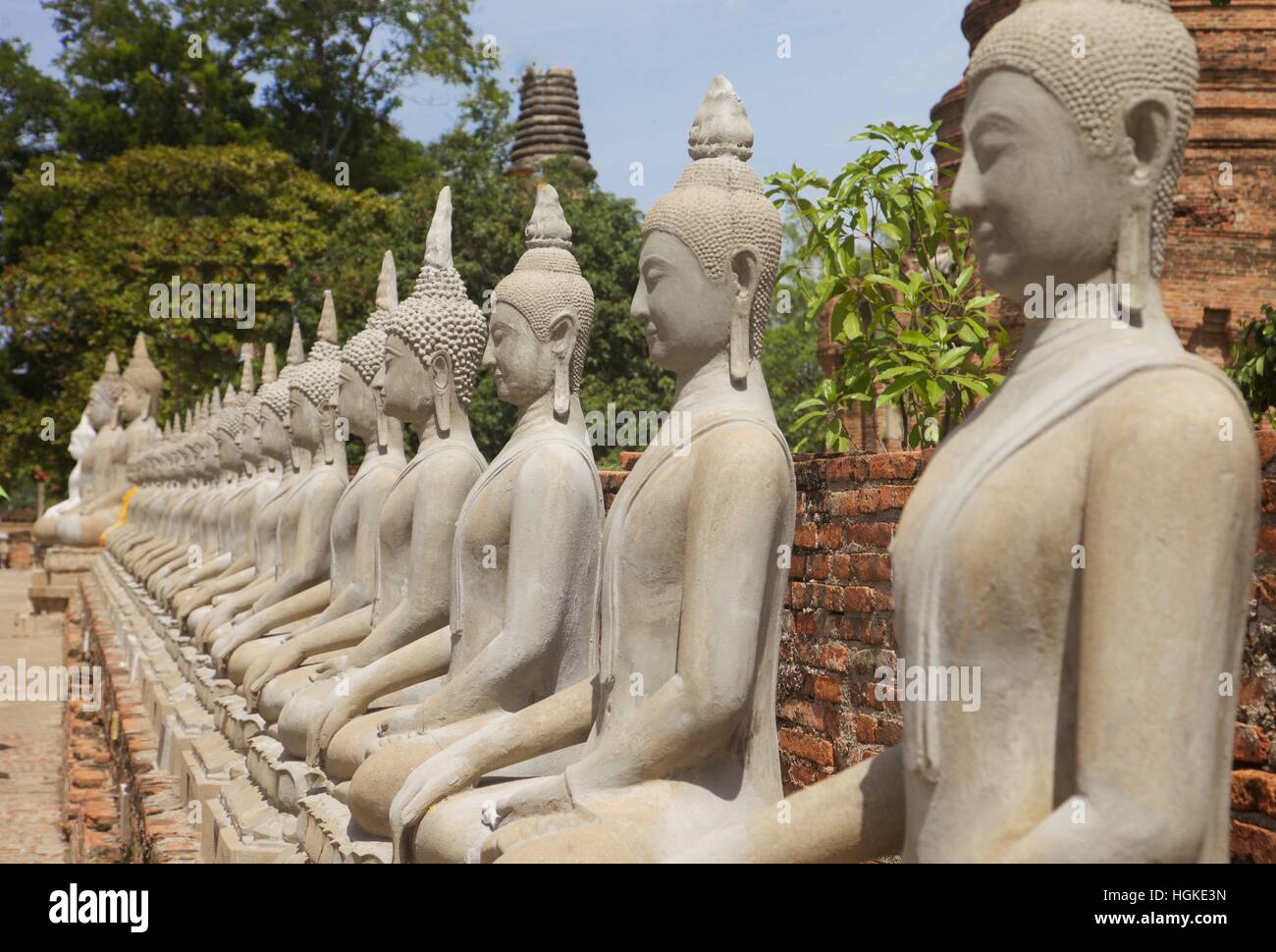 A line of Buddhas at the old Siam capital city of Ayuttaya, Thailand ...