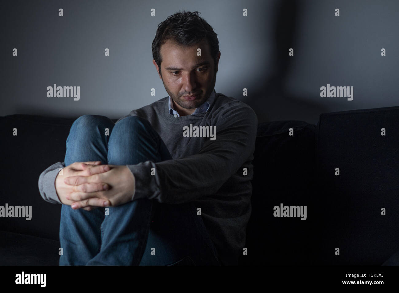 Man dark alone sad hi-res stock photography and images - Alamy