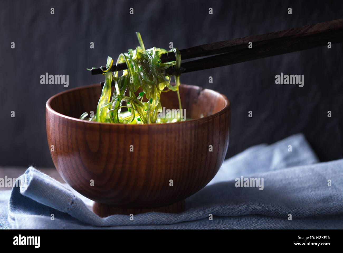 Chinese chopsticks with chuka salad horizontal Stock Photo - Alamy