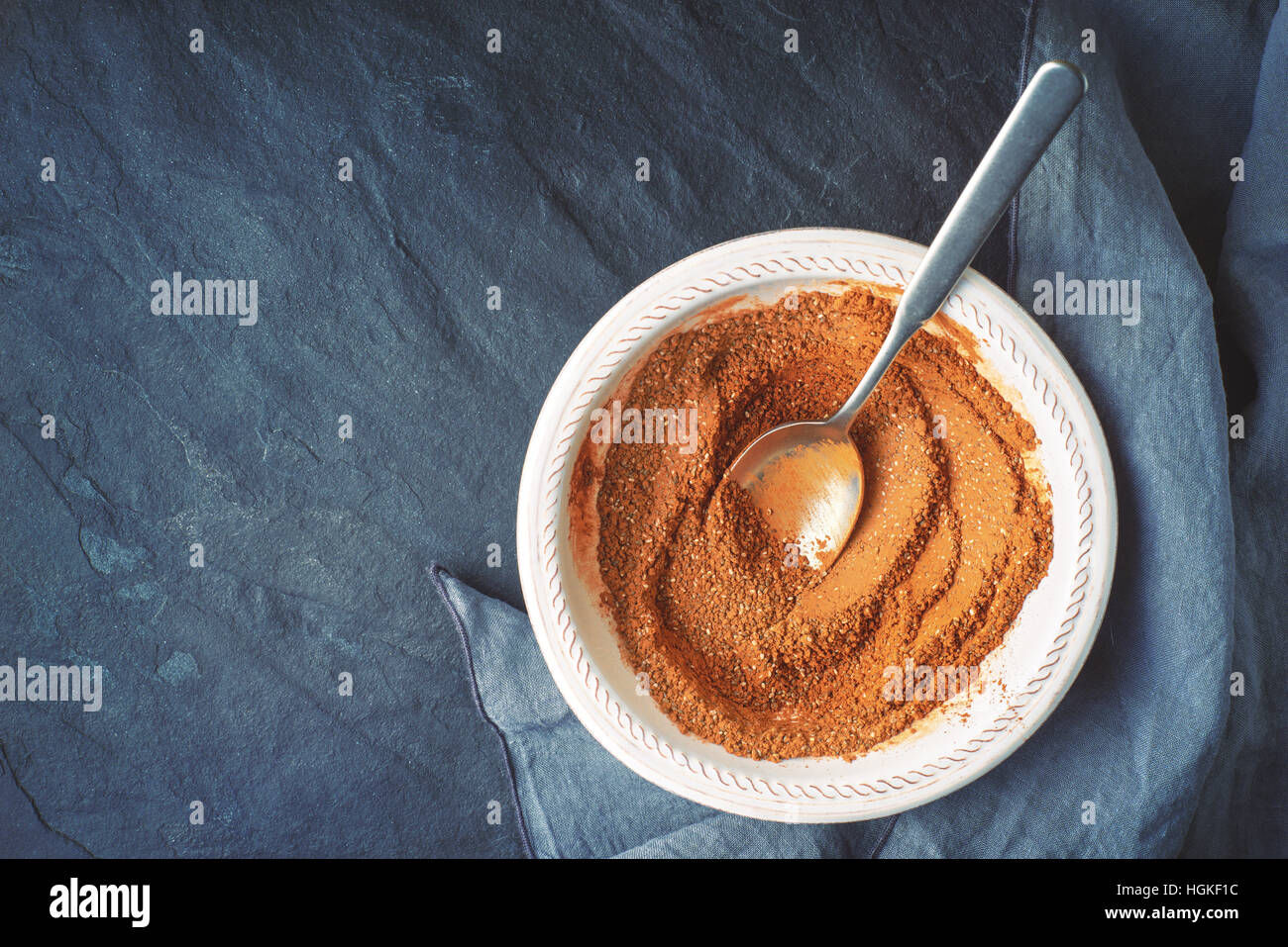 Cocoa powder with chia seeds on the ceramic plate top view Stock Photo ...