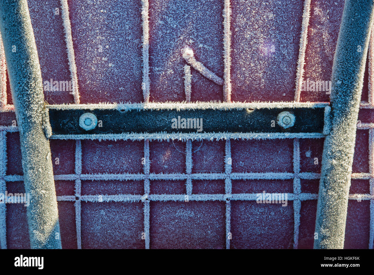 Hoar frost on the underside of a plastic wheelbarrow. Abstract Stock ...