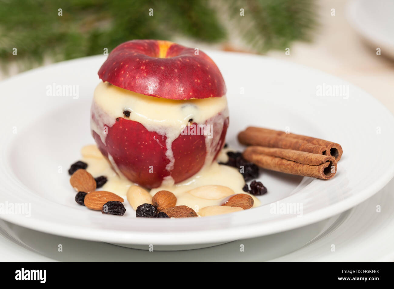 Baked apple on plate Stock Photo - Alamy