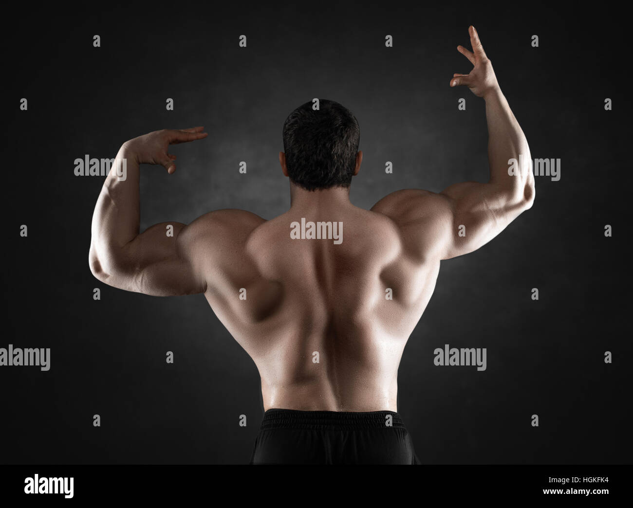 Close up of sports man's muscular back isolated Stock Photo - Alamy