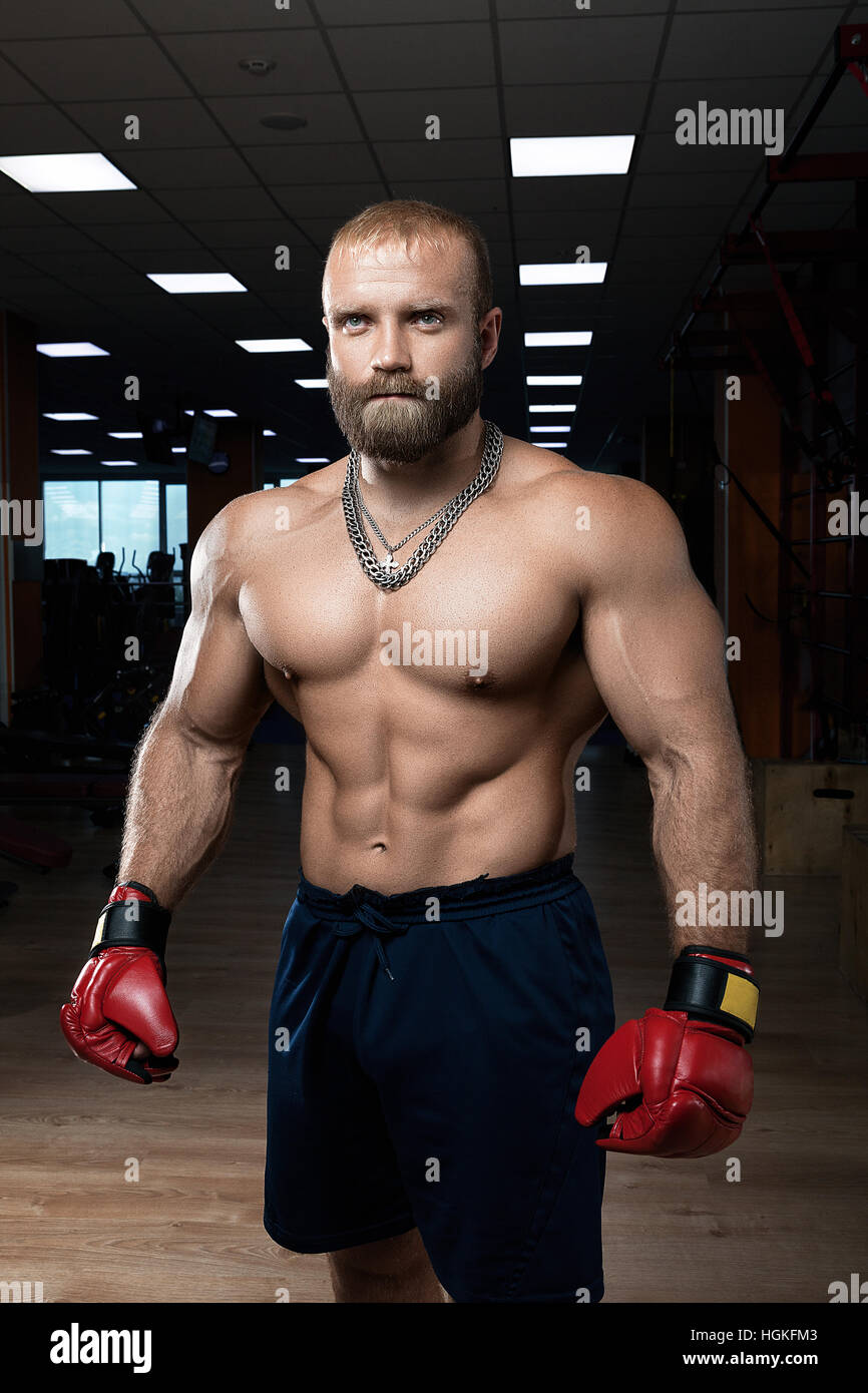 Strong muscular man boxing at the gym Stock Photo - Alamy