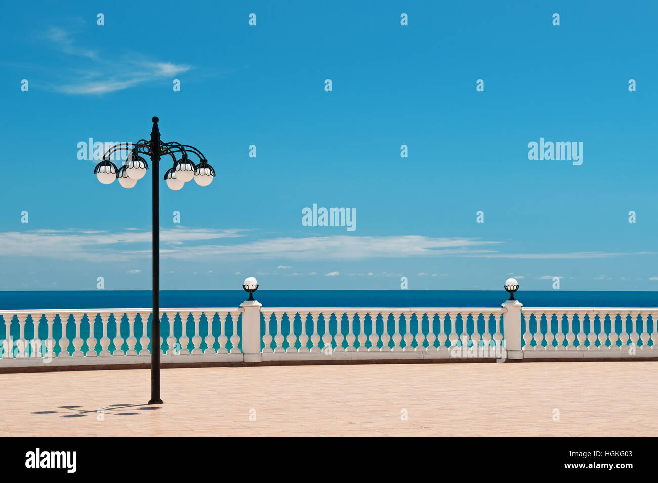 beautiful promenade with lanterns and white railings Stock Photo - Alamy