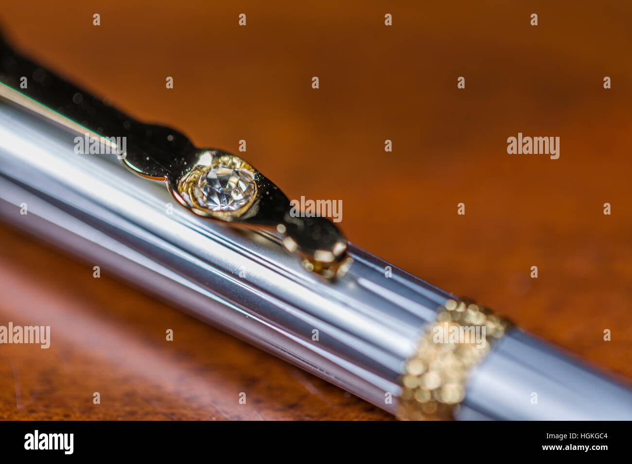 Pen On Wooden Table Stock Photo - Alamy