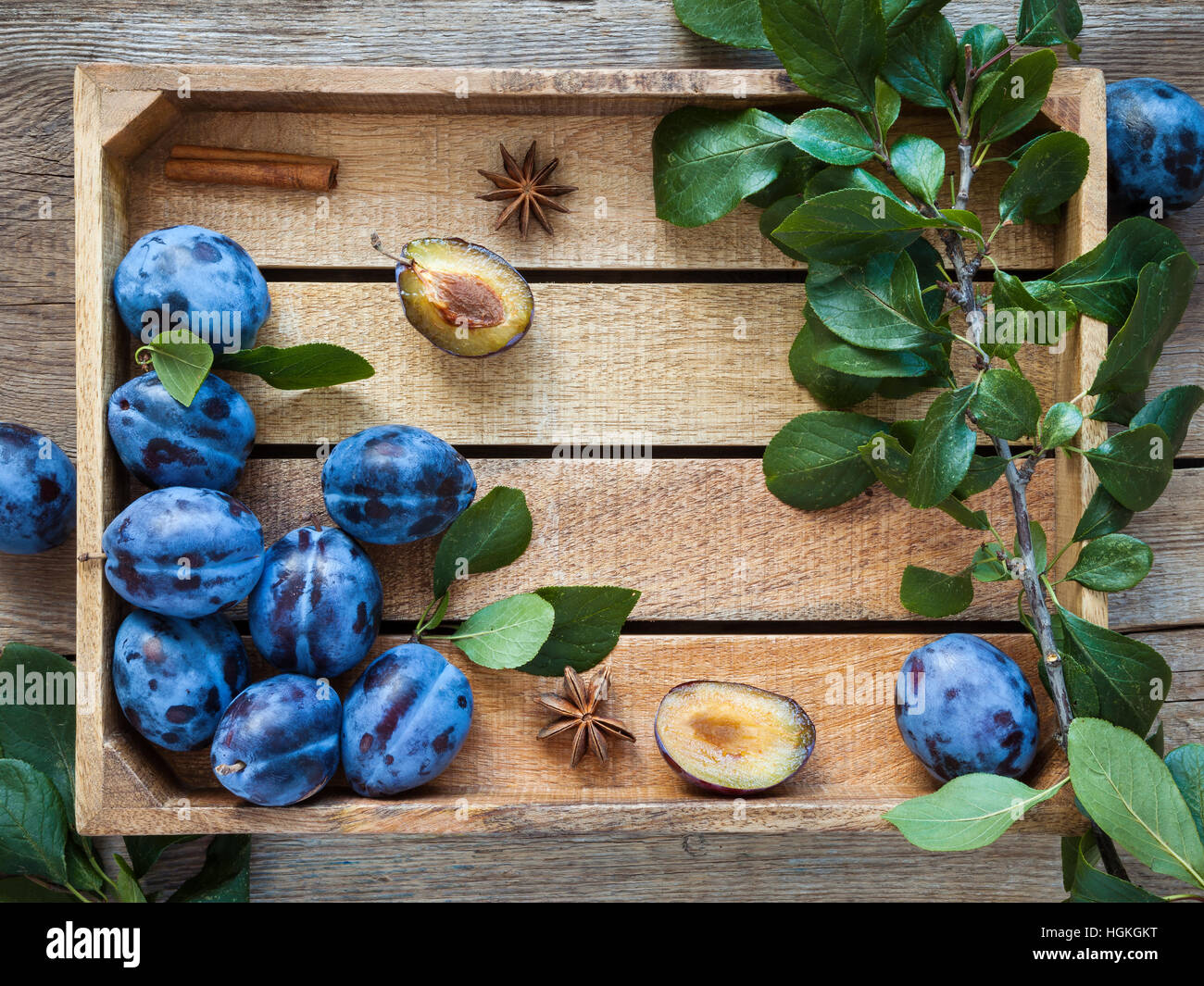 Fresh plums in wooden box. Top view, flat lay Stock Photo - Alamy