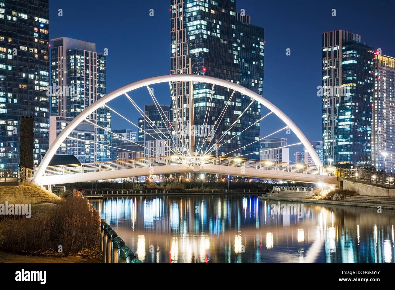 architecture with bridge at night time in Incheon Central Park South ...
