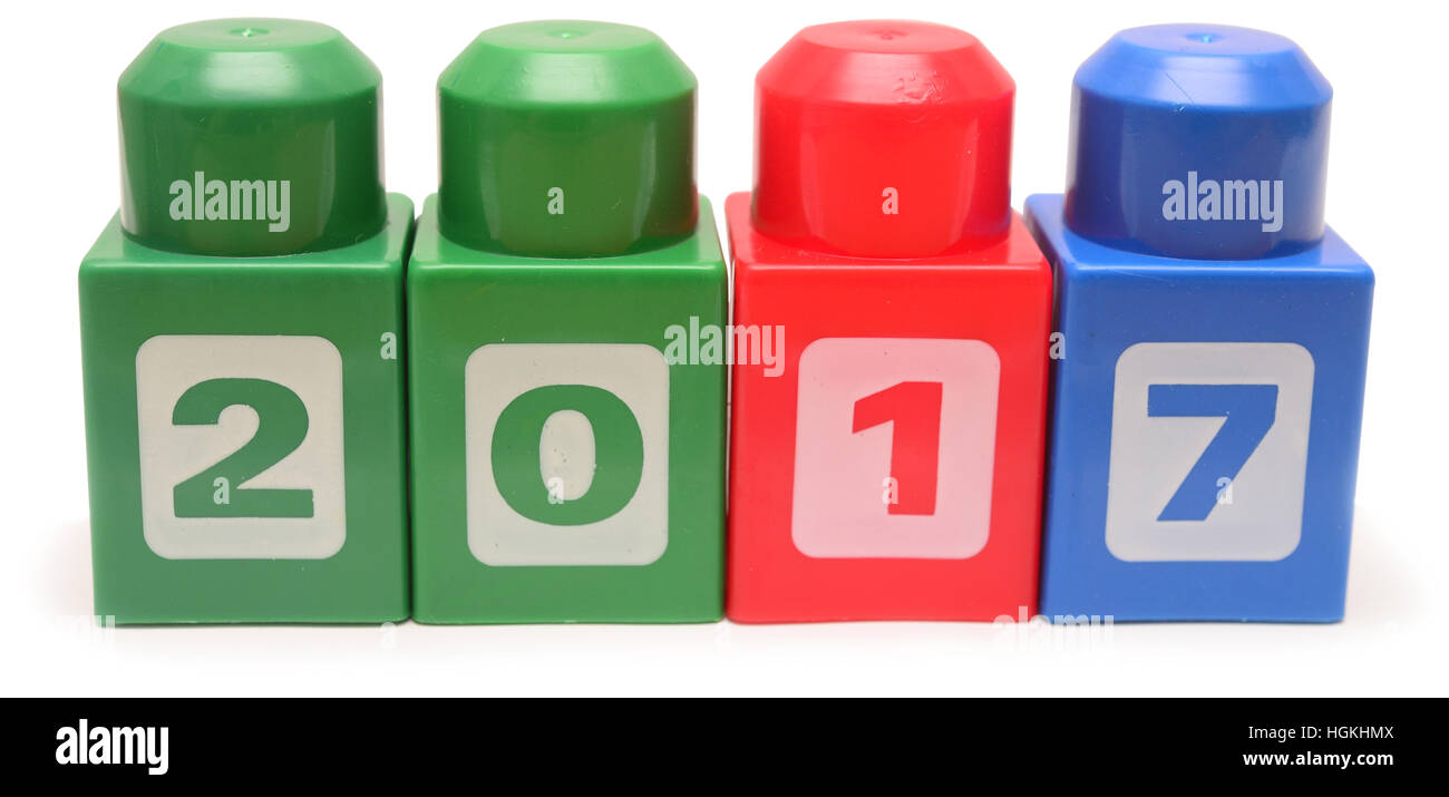 Colorful stacked toy plastic building blocks isolated on white ...