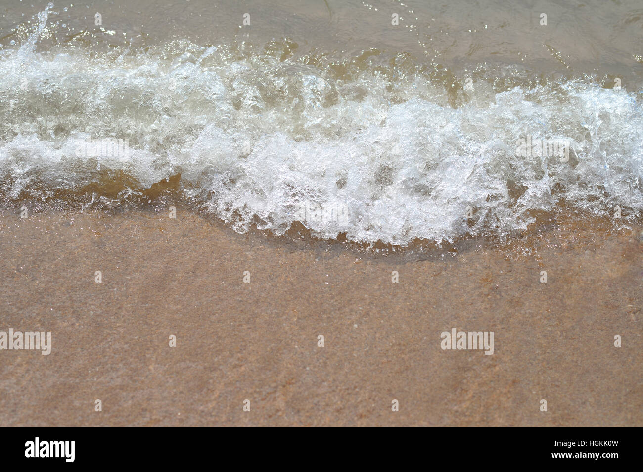Wave on sandy beach south hi-res stock photography and images - Alamy