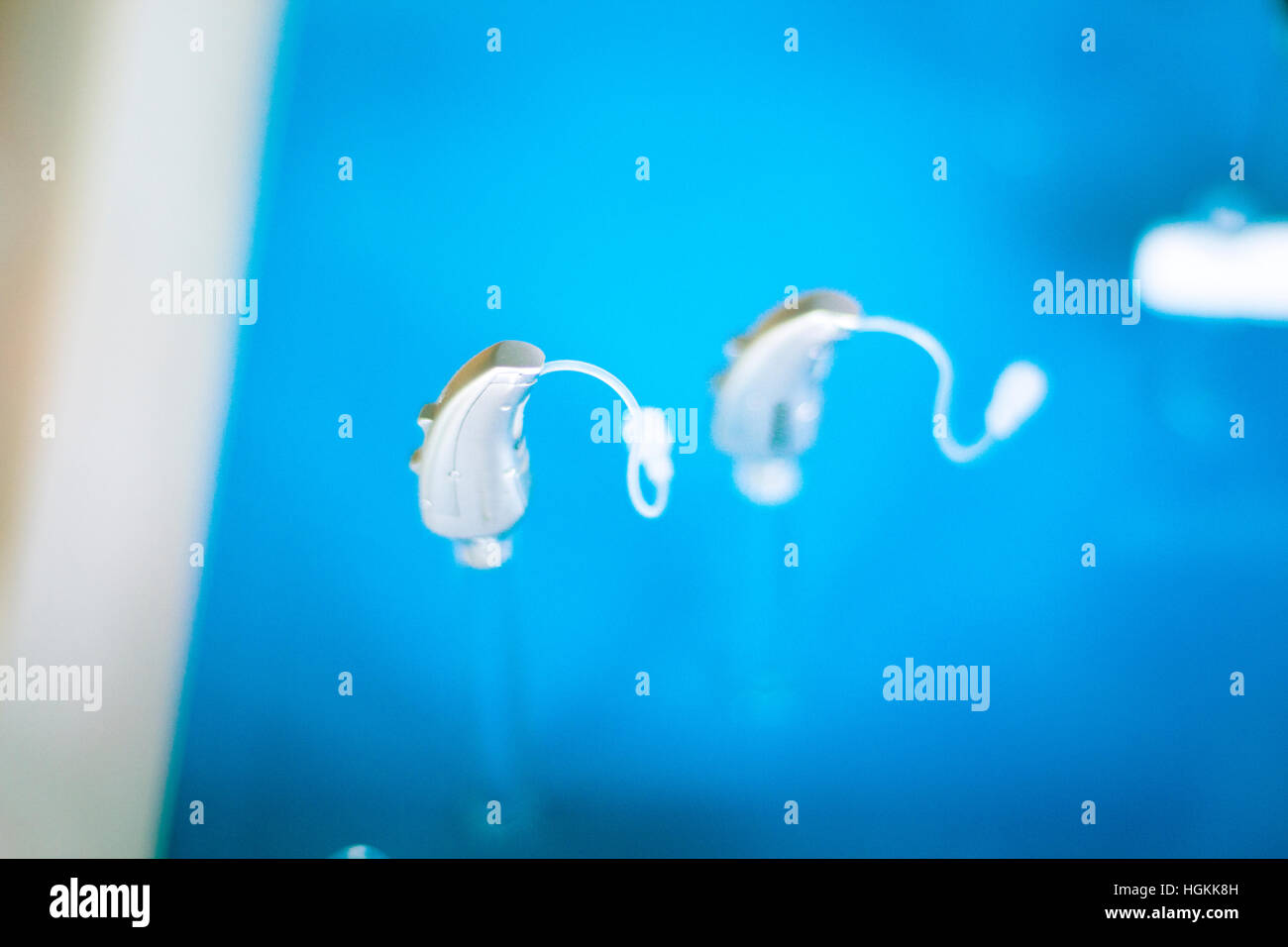 Modern high technology digital hearing aids in retail store shop window ...