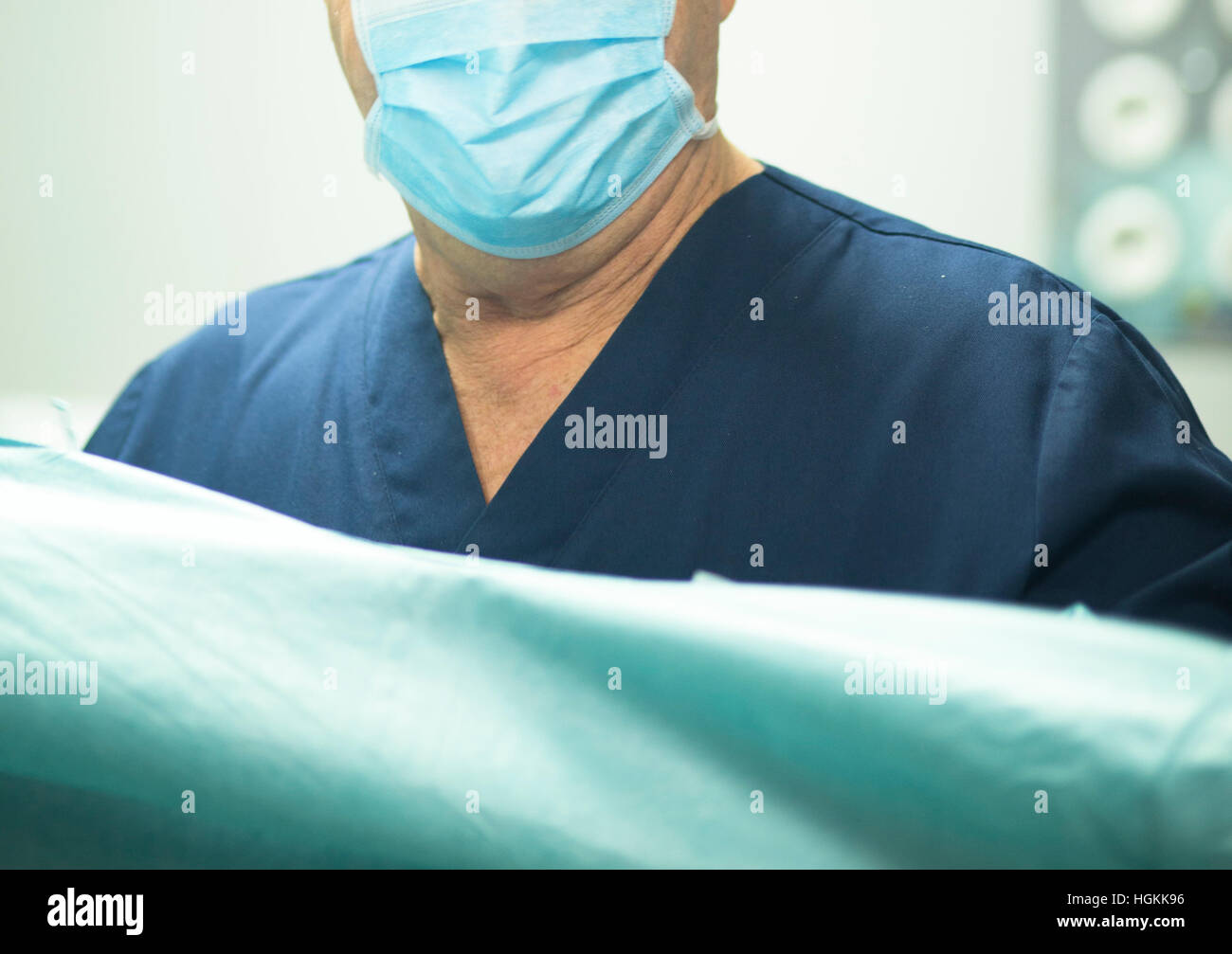 Surgeon in hospital surgery in sterile uniform "scrubs" in operating ...