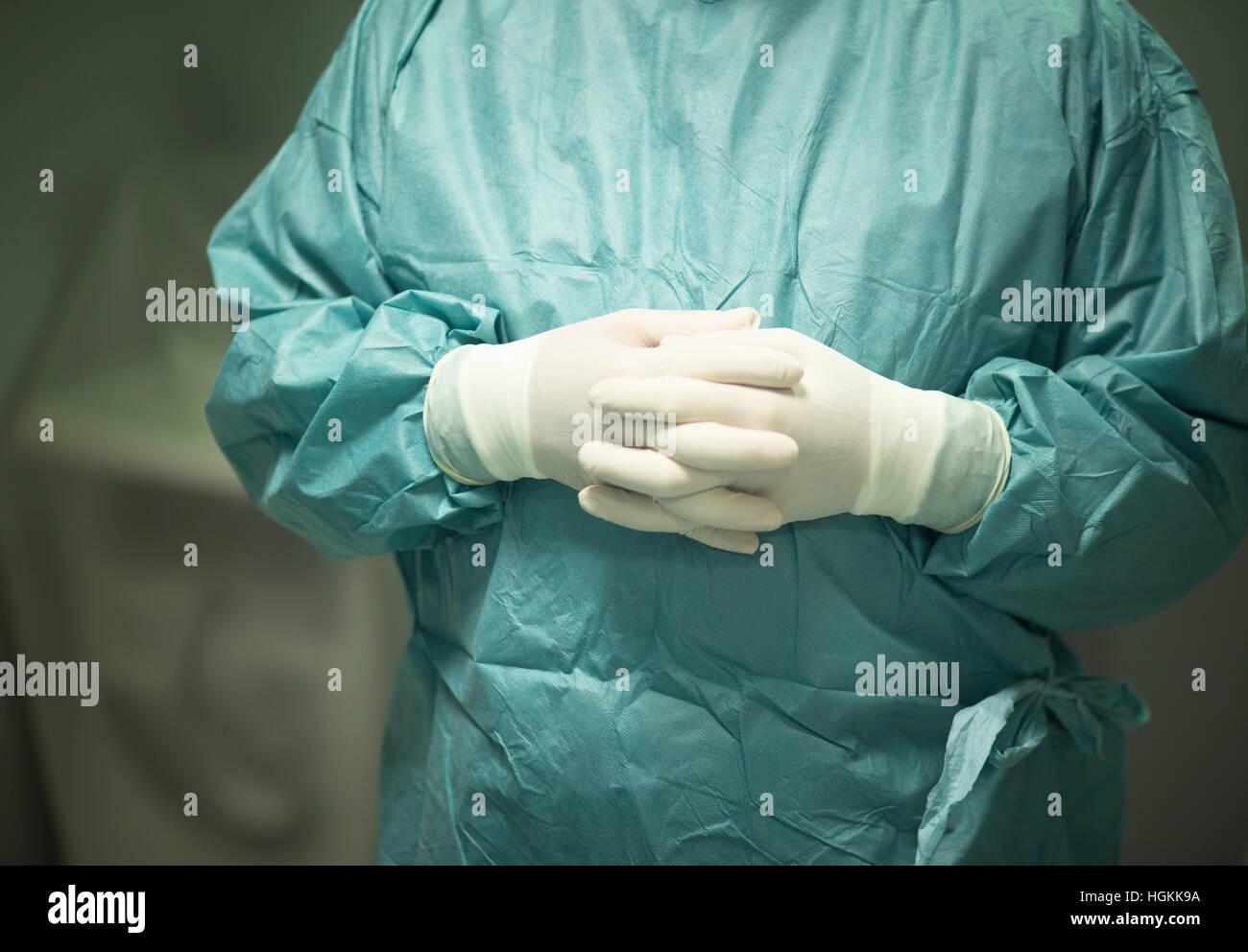 Surgeon in hospital surgery in sterile uniform "scrubs" in operating ...