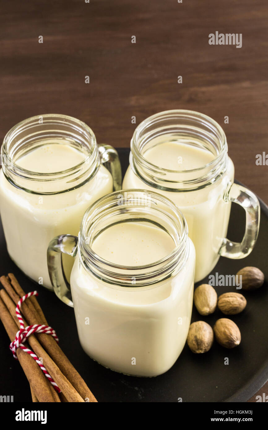 Traditional holiday drink egg nog in drinking mason jars Stock Photo ...