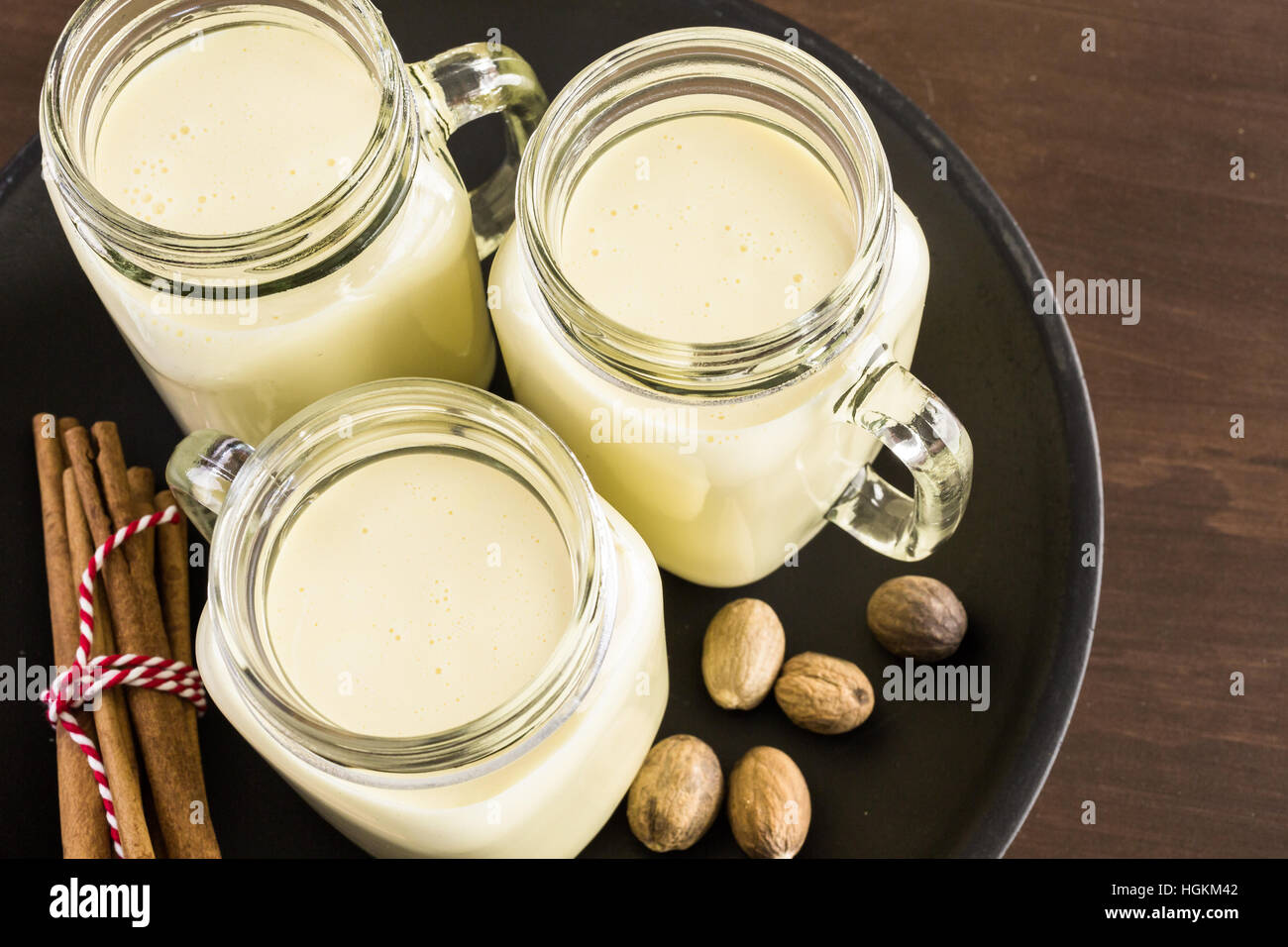 Traditional holiday drink egg nog in drinking mason jars Stock Photo ...