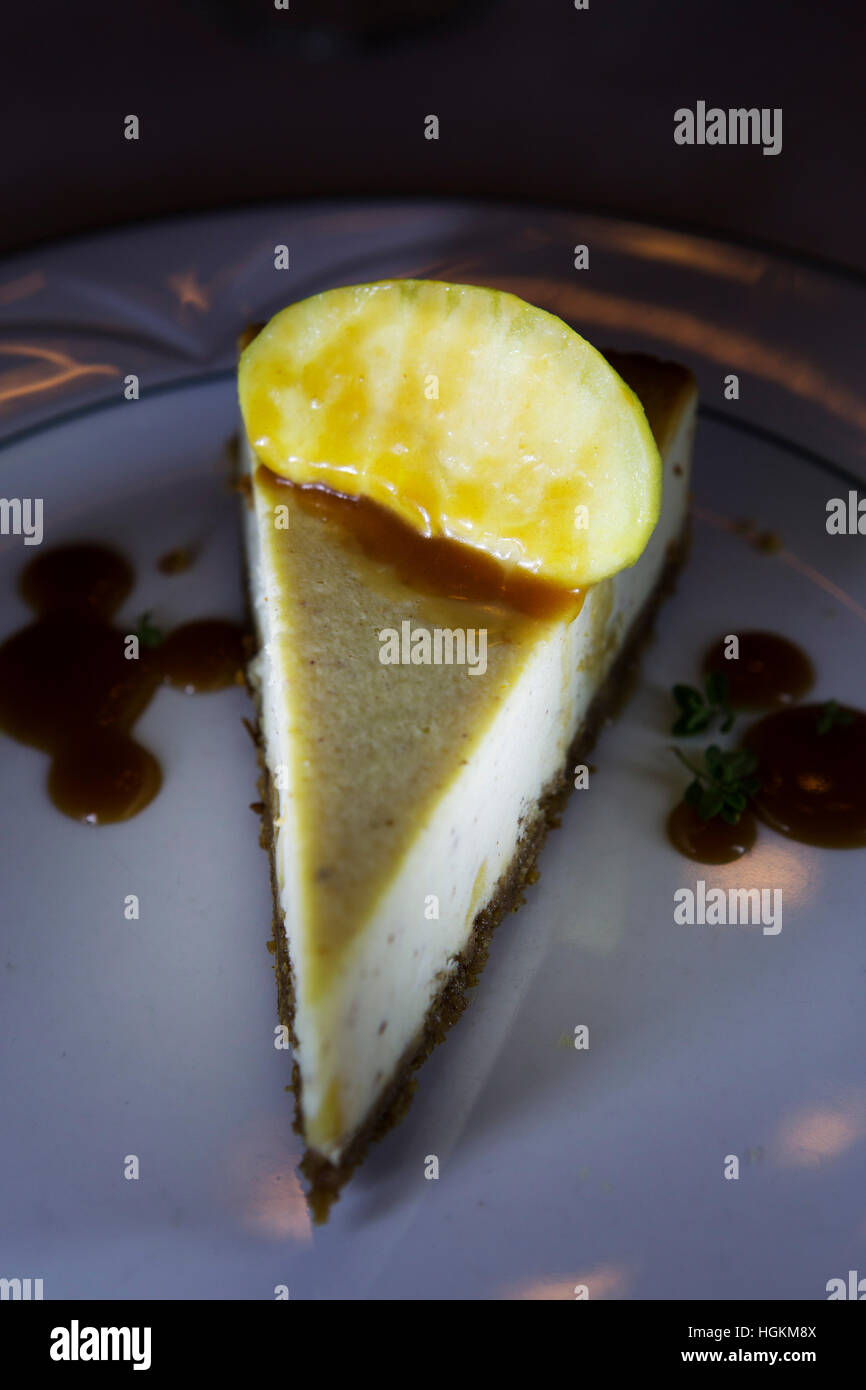 Cheesecake served in Nova Scotia, Canada. The cheesecake is topped by a ...