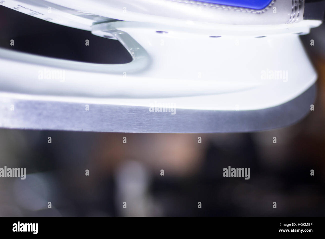 Ice skates in skate store shop window on display on sale for skating on ...