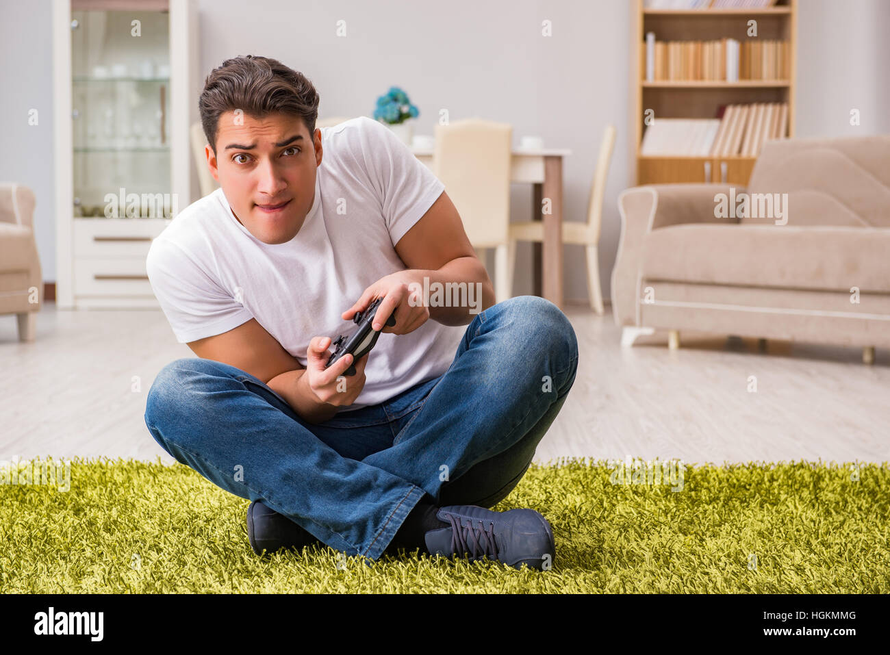 Man addicted to computer games Stock Photo - Alamy