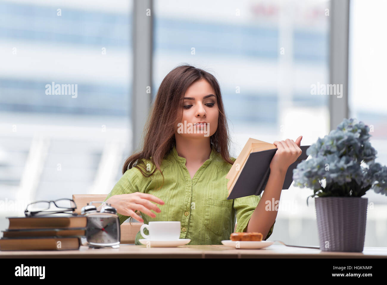 Young student preparing for exams drinking tea Stock Photo - Alamy