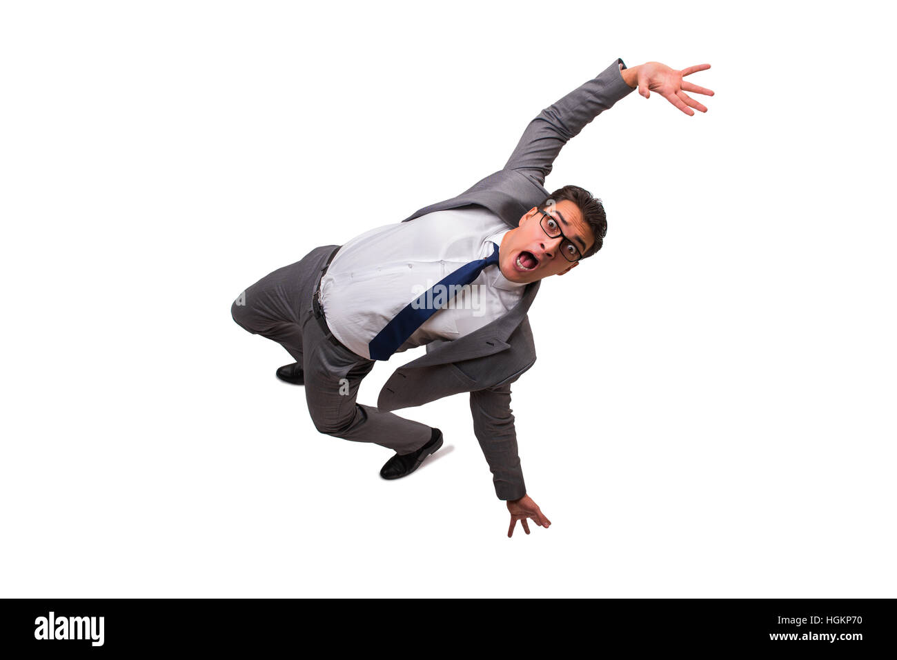 Falling businessman isolated on the white background Stock Photo - Alamy