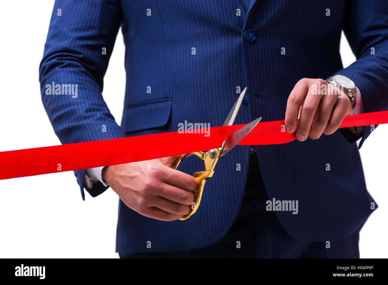 Businessman cutting red ribbon isolated on white Stock Photo - Alamy