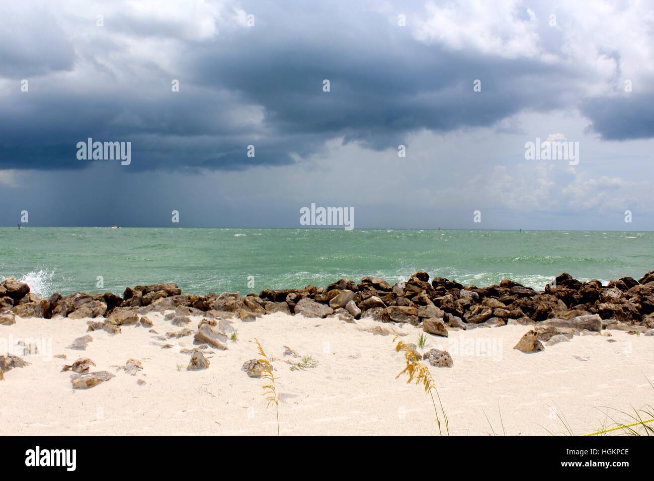 The dark rain clouds over the ocean water Stock Photo - Alamy