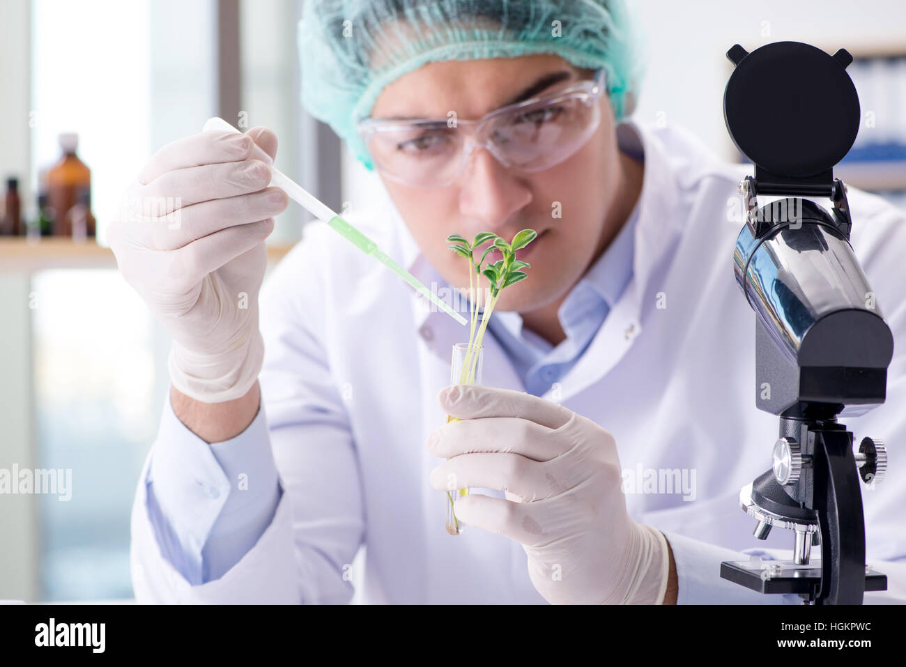 Biotechnology concept with scientist in lab Stock Photo - Alamy