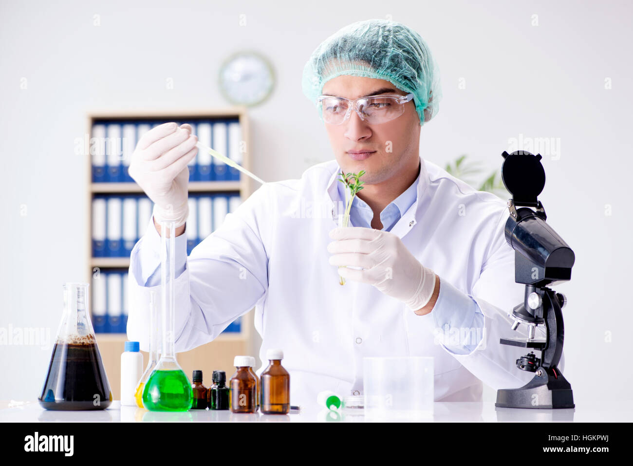 Biotechnology concept with scientist in lab Stock Photo - Alamy