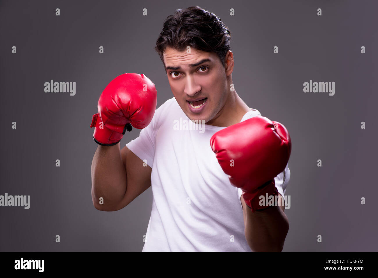 Handsome boxer in boxing concept Stock Photo - Alamy