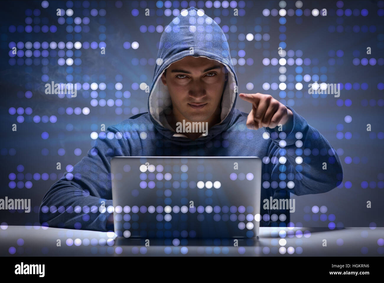Young hacker in data security concept Stock Photo - Alamy