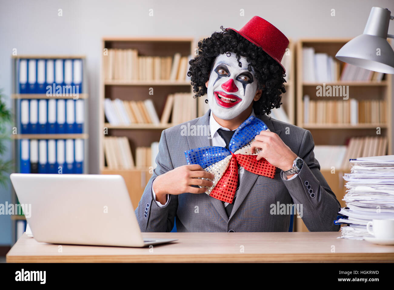 Clown businessman working in the office Stock Photo - Alamy