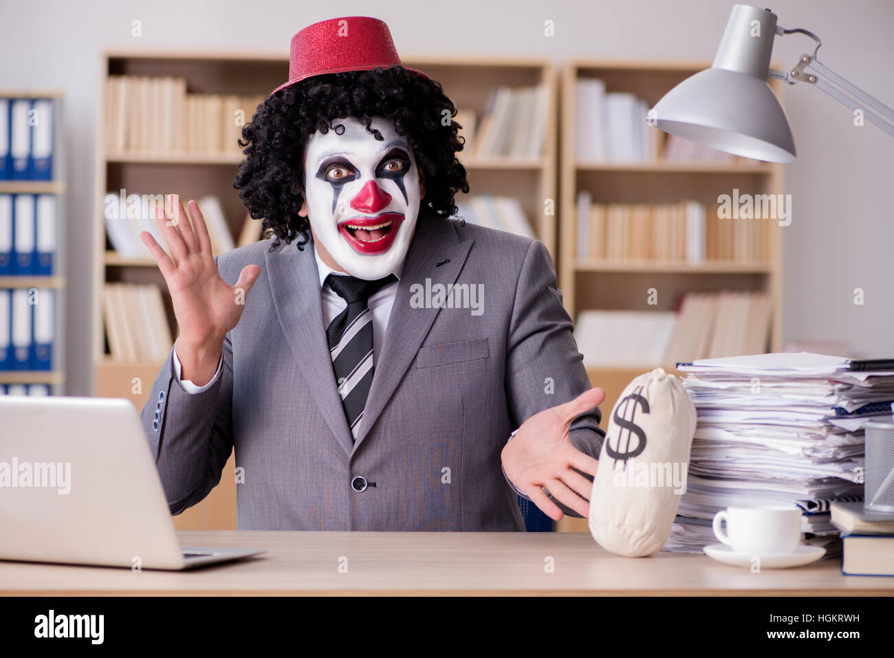 Clown businessman working in the office Stock Photo - Alamy