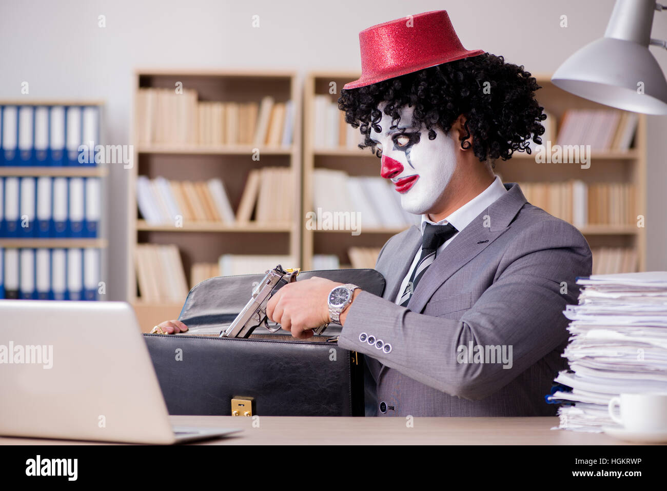 Clown businessman working in the office Stock Photo - Alamy