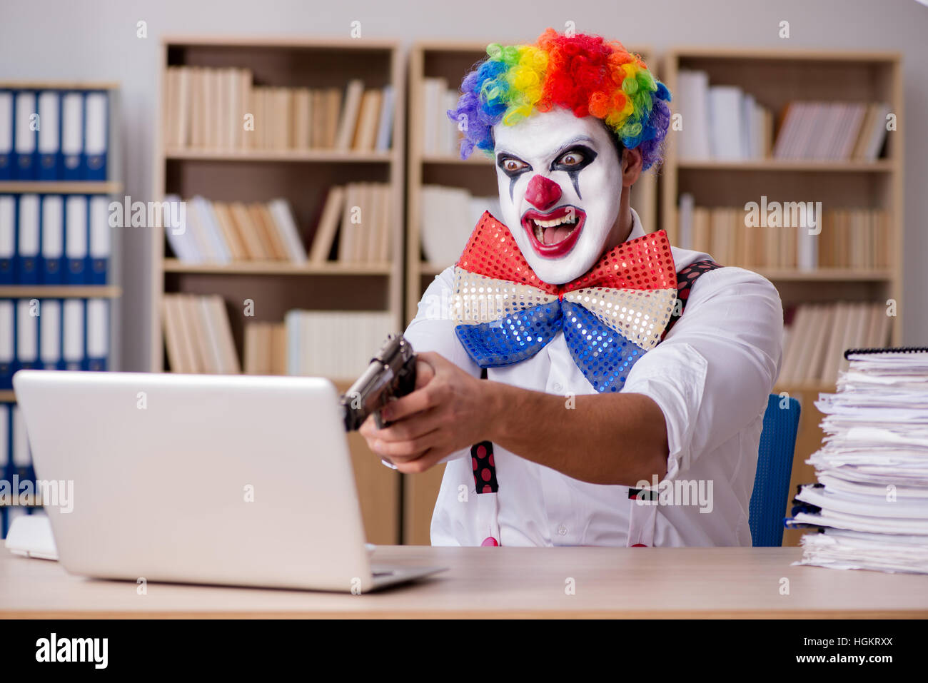 Clown businessman working in the office Stock Photo - Alamy