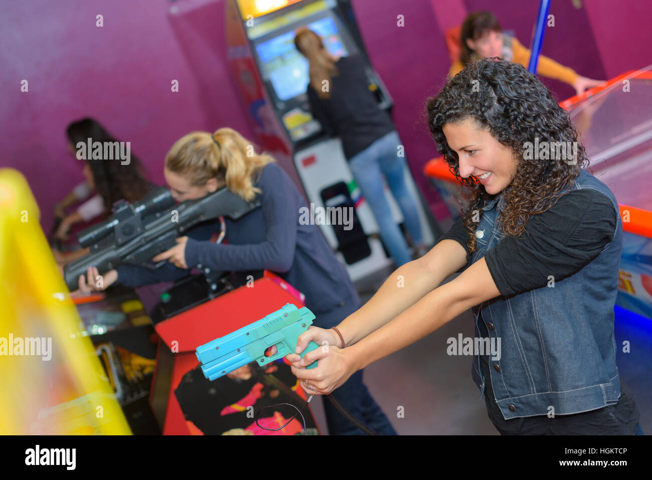 girls at the amusement arcade Stock Photo - Alamy
