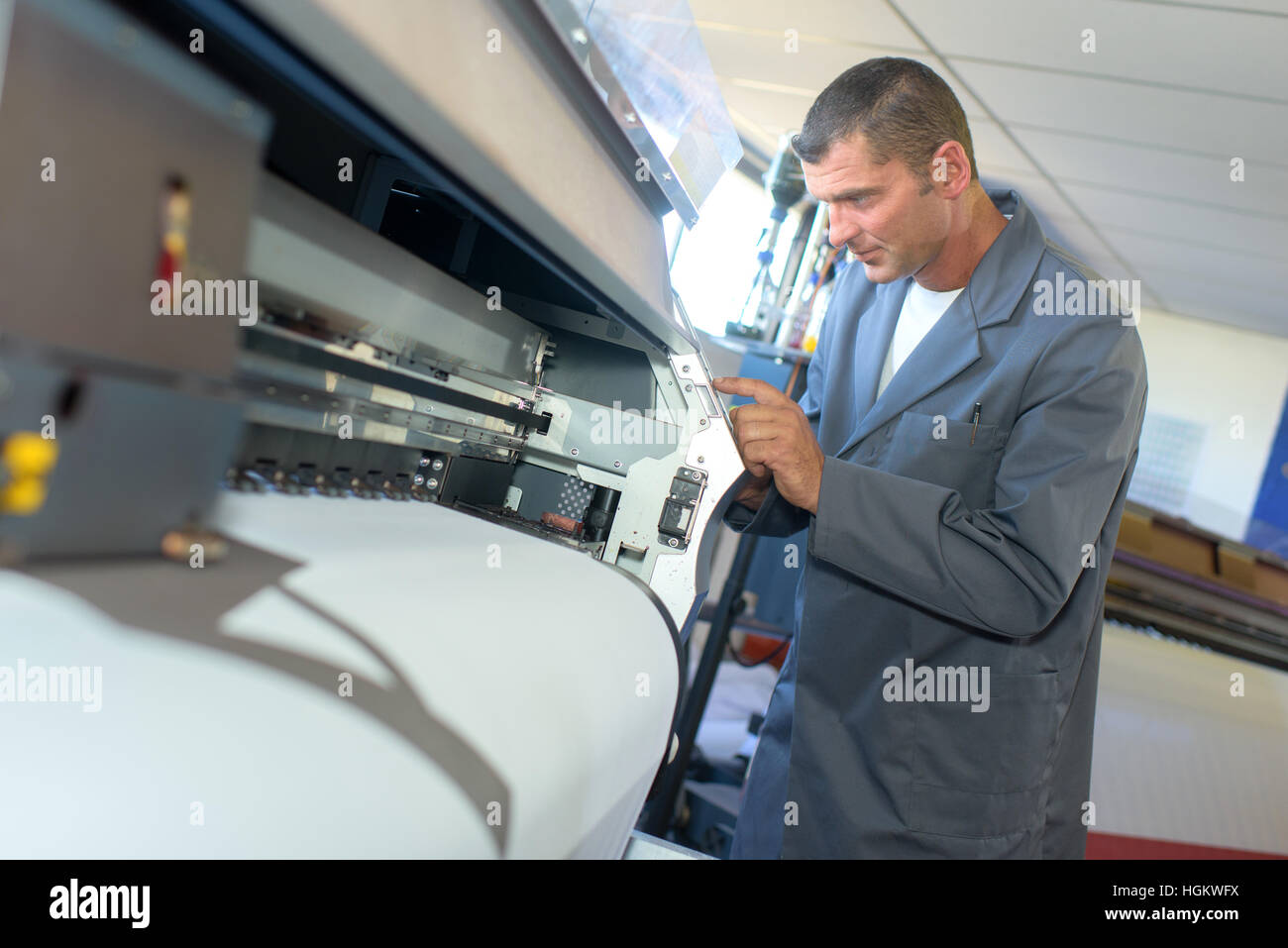 Setting up printing machine hi-res stock photography and images - Alamy