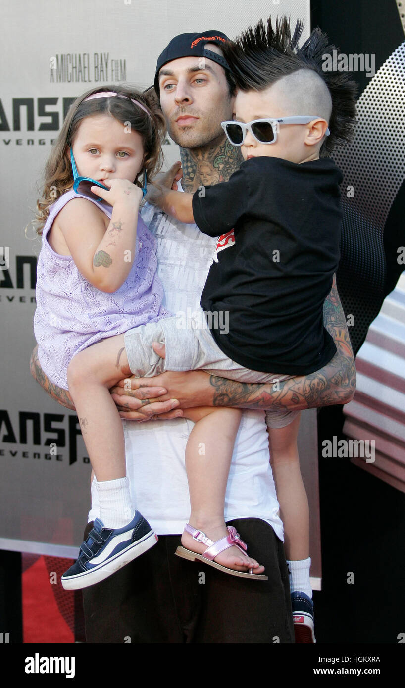 Travis Barker and his kids, Alabama and Landon arrives at the premiere ...