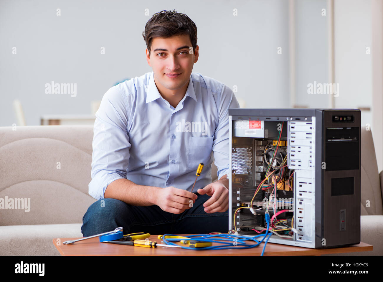 IT technician repairing broken pc desktop computer Stock Photo - Alamy