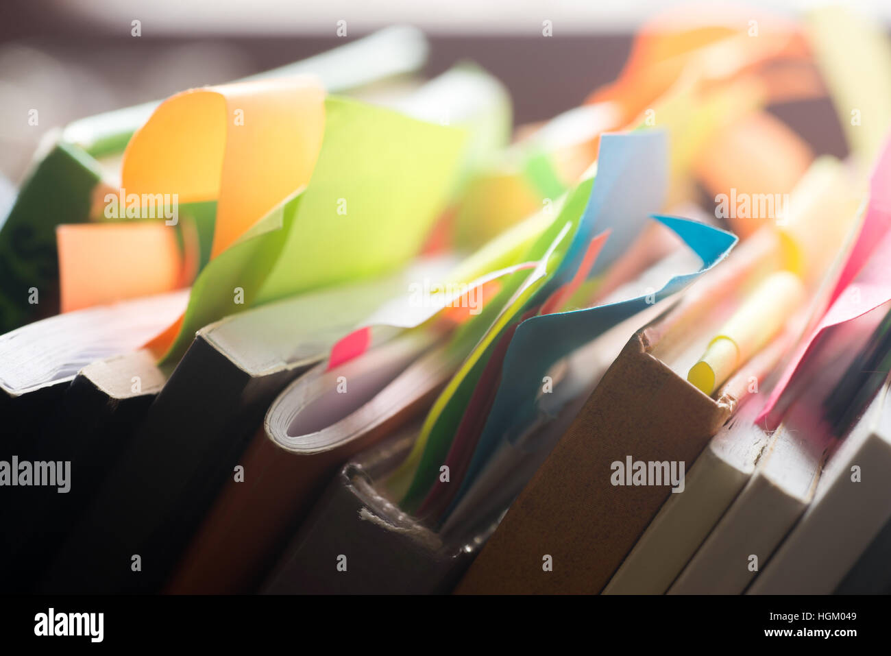 group of books and notebooks with multicolored stickers Stock Photo - Alamy