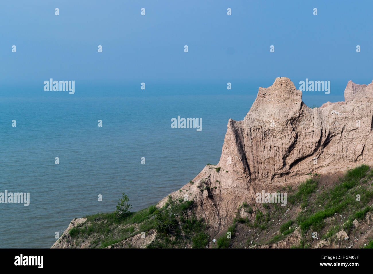Cliffs overlooking a lake Stock Photo - Alamy