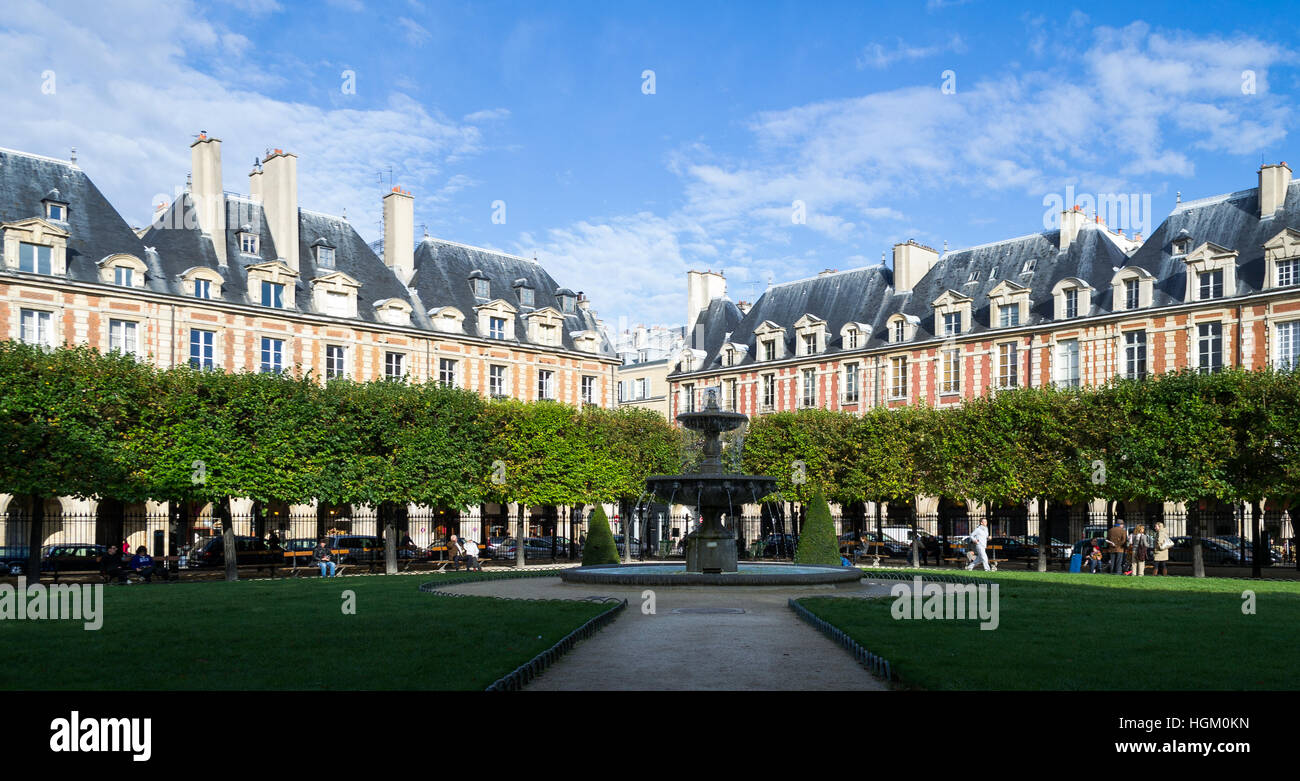 Group of row houses near a park Stock Photo - Alamy