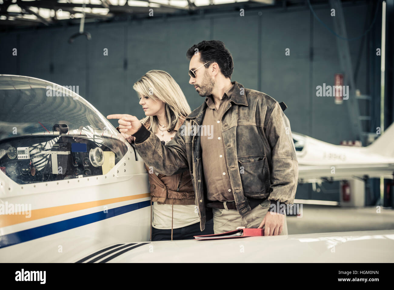 Female beginner pilot with instructor Stock Photo - Alamy