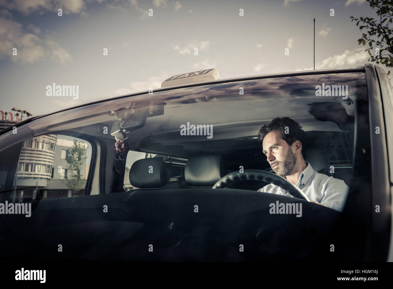 Portrait of a taxi driver Stock Photo - Alamy
