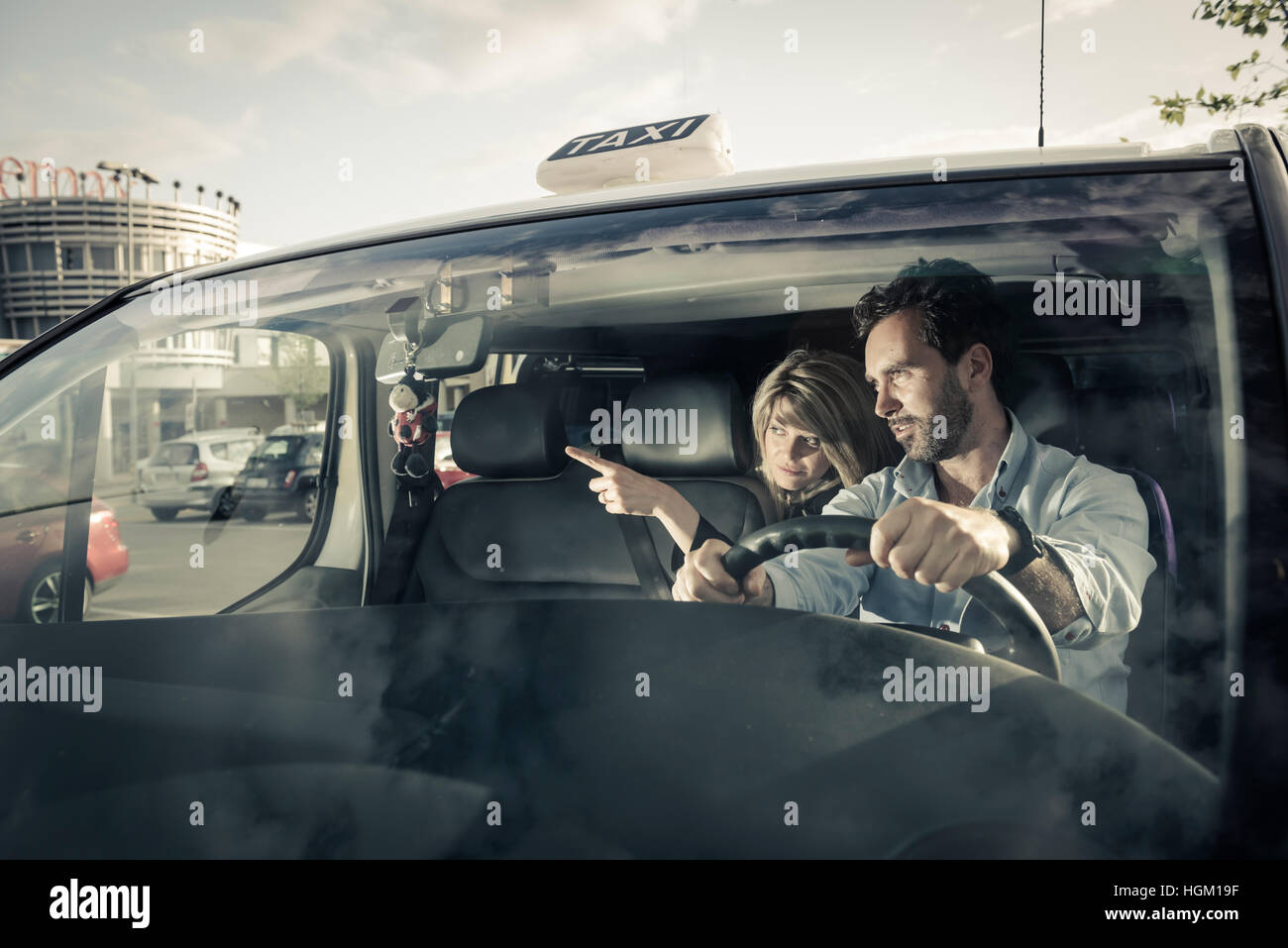 Portrait of a taxi driver Stock Photo - Alamy