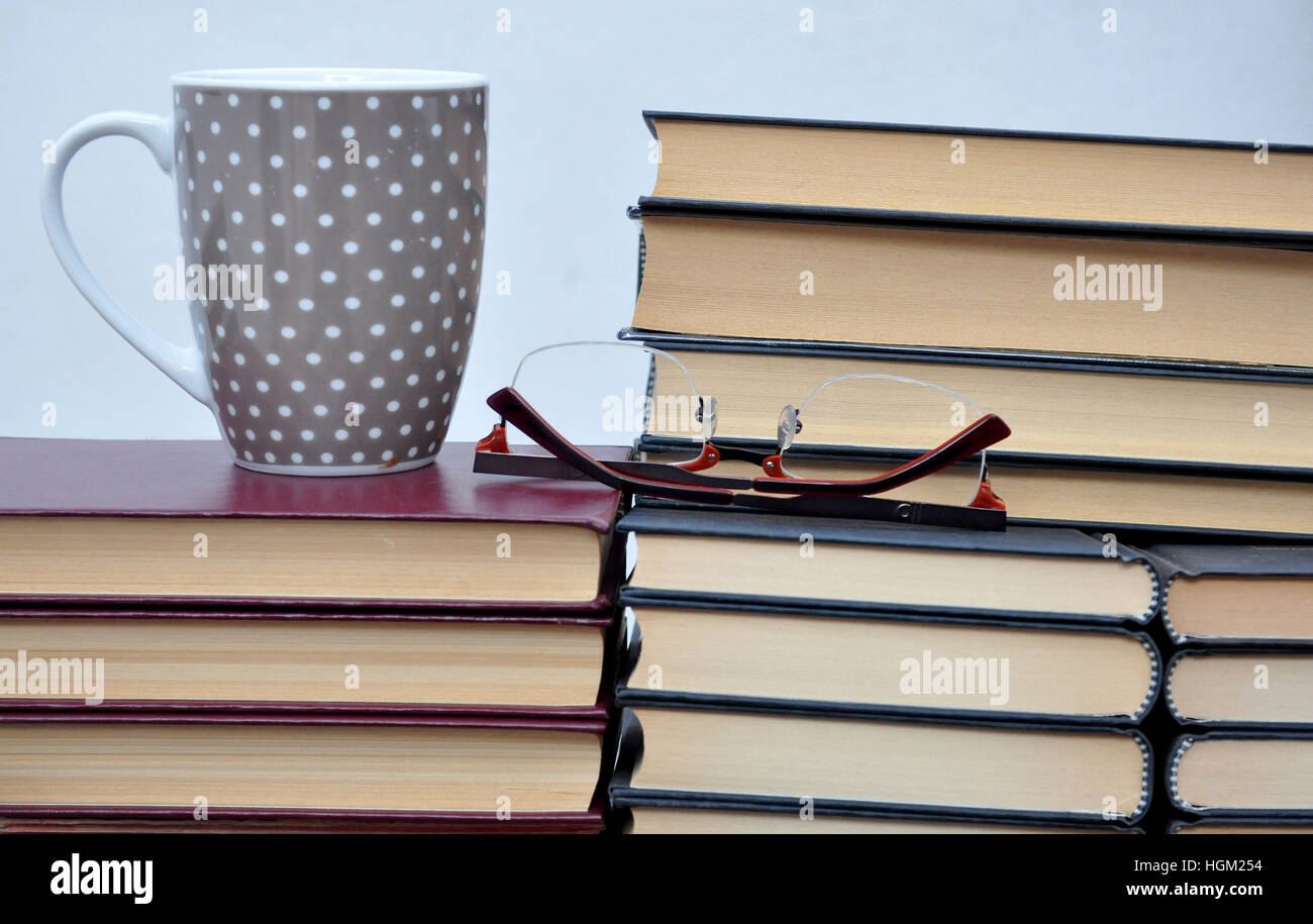 books and cups Stock Photo - Alamy
