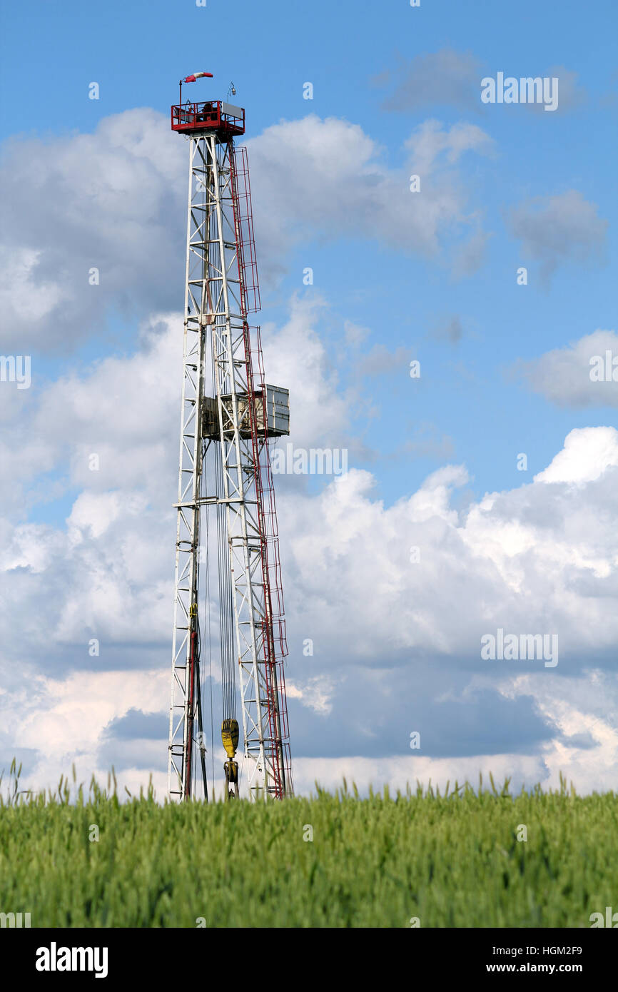 oil drilling rig and blue sky Stock Photo - Alamy