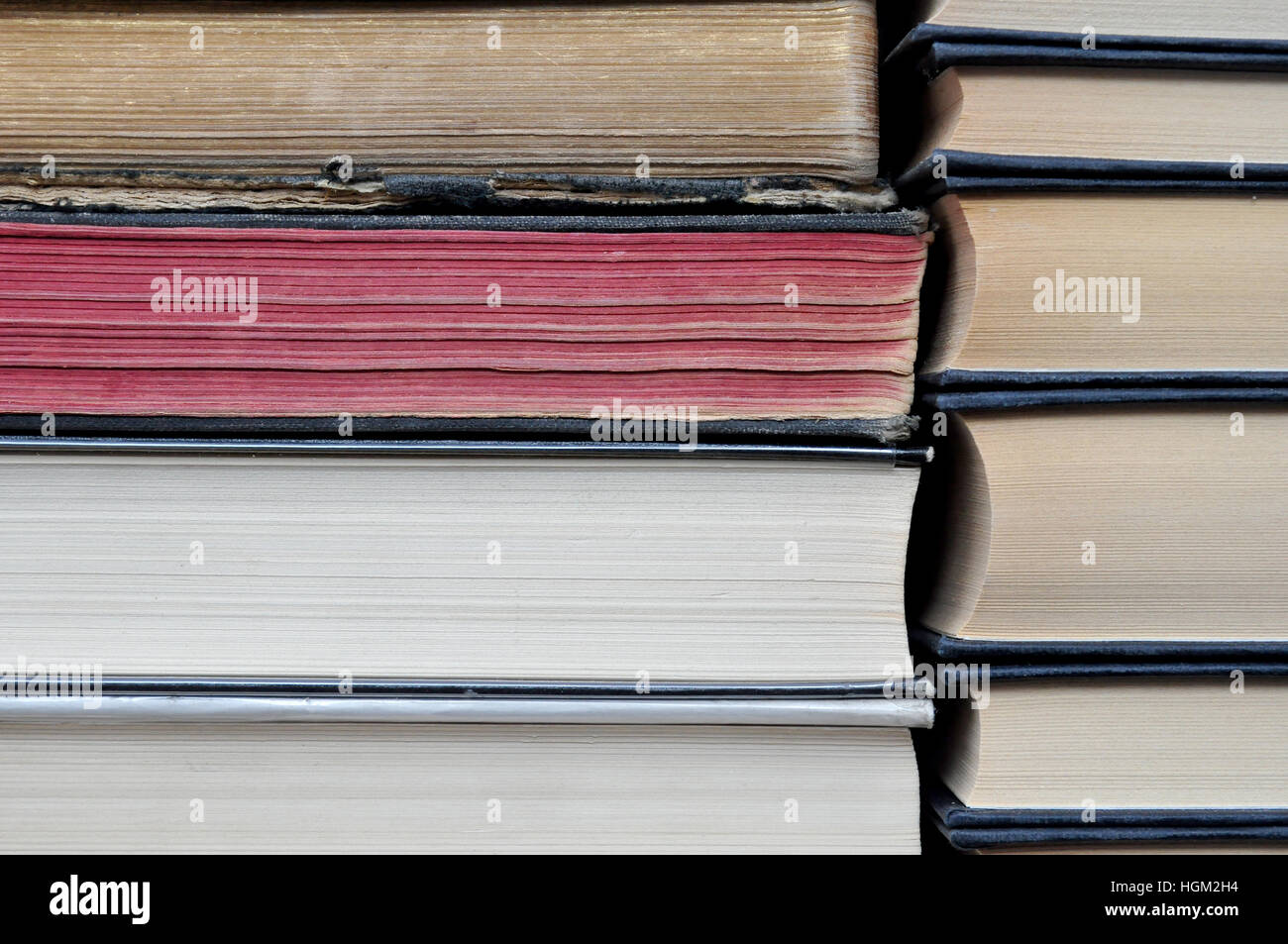piles of book lined up Stock Photo - Alamy